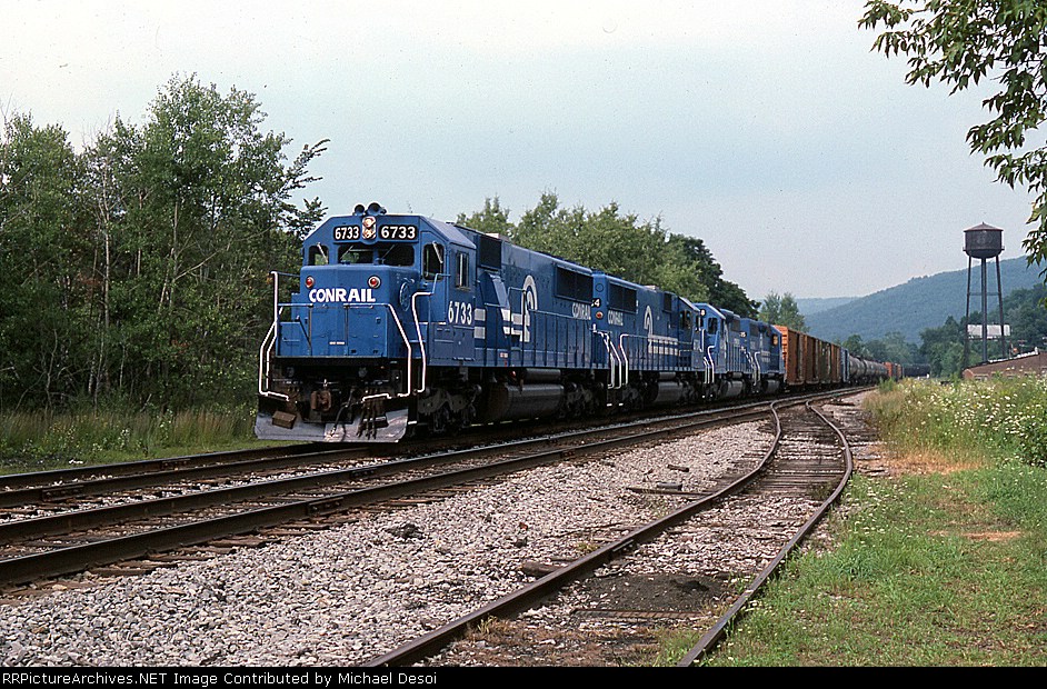CR SD-50 #6733 leads a westbound